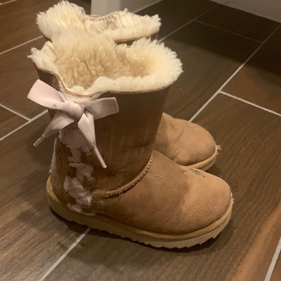 UGG | Shoes | Uggsboots With Pinkbows On The Side They Have Torn ...